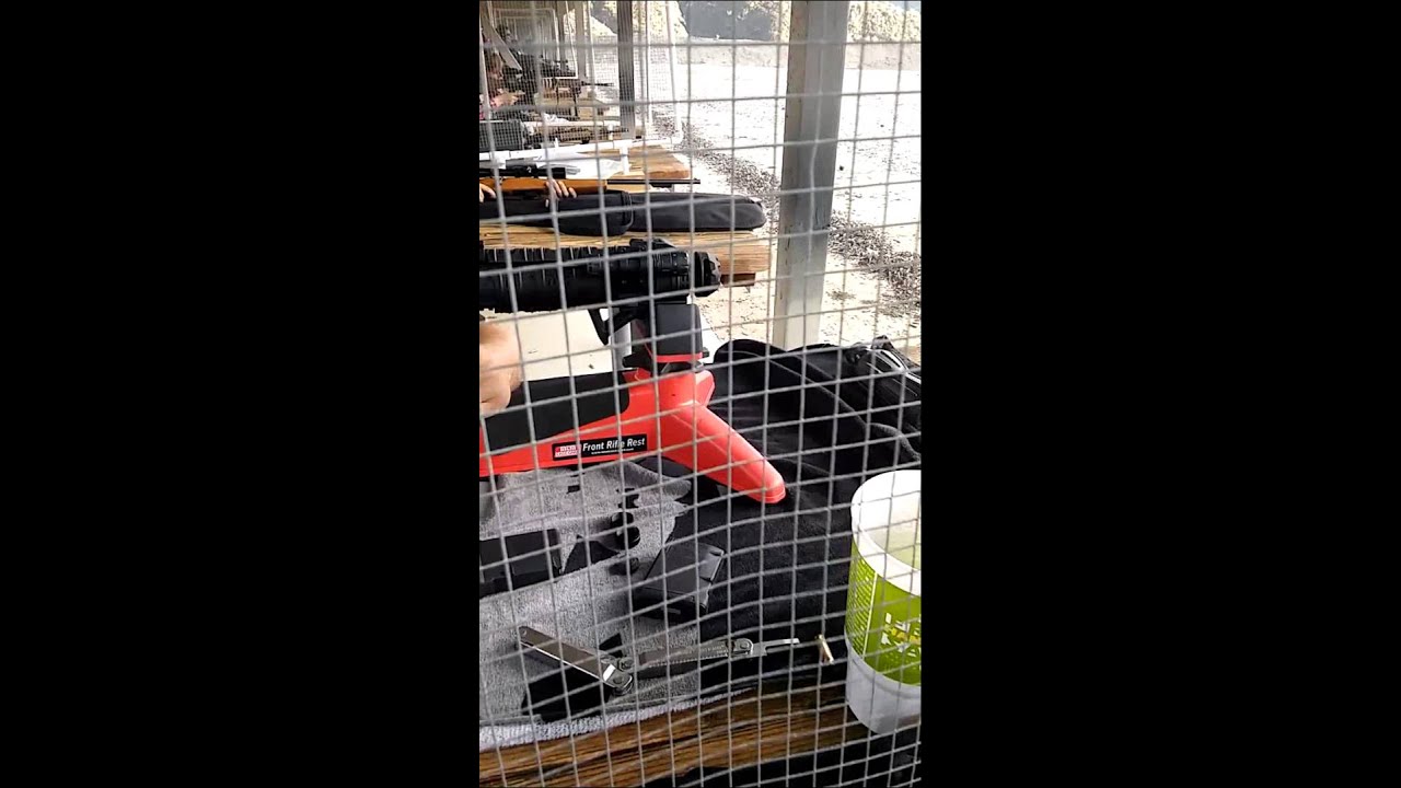 Cookie cutter muzzle brake in action - YouTube