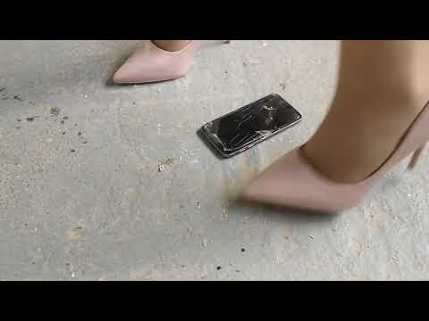 Crushing and trampling a phone in heels