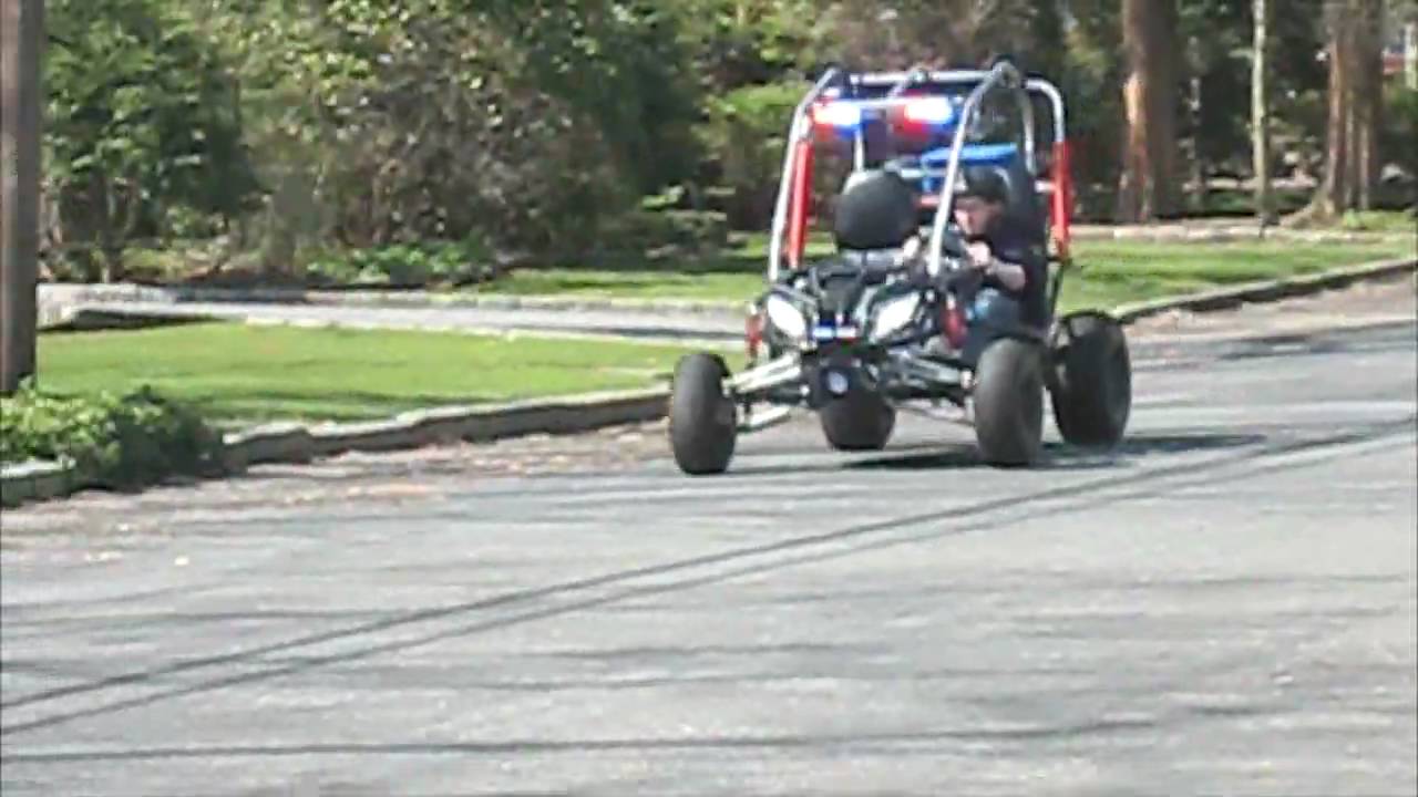 My Police Go-Kart being started and Rode around with lights and sirens ...