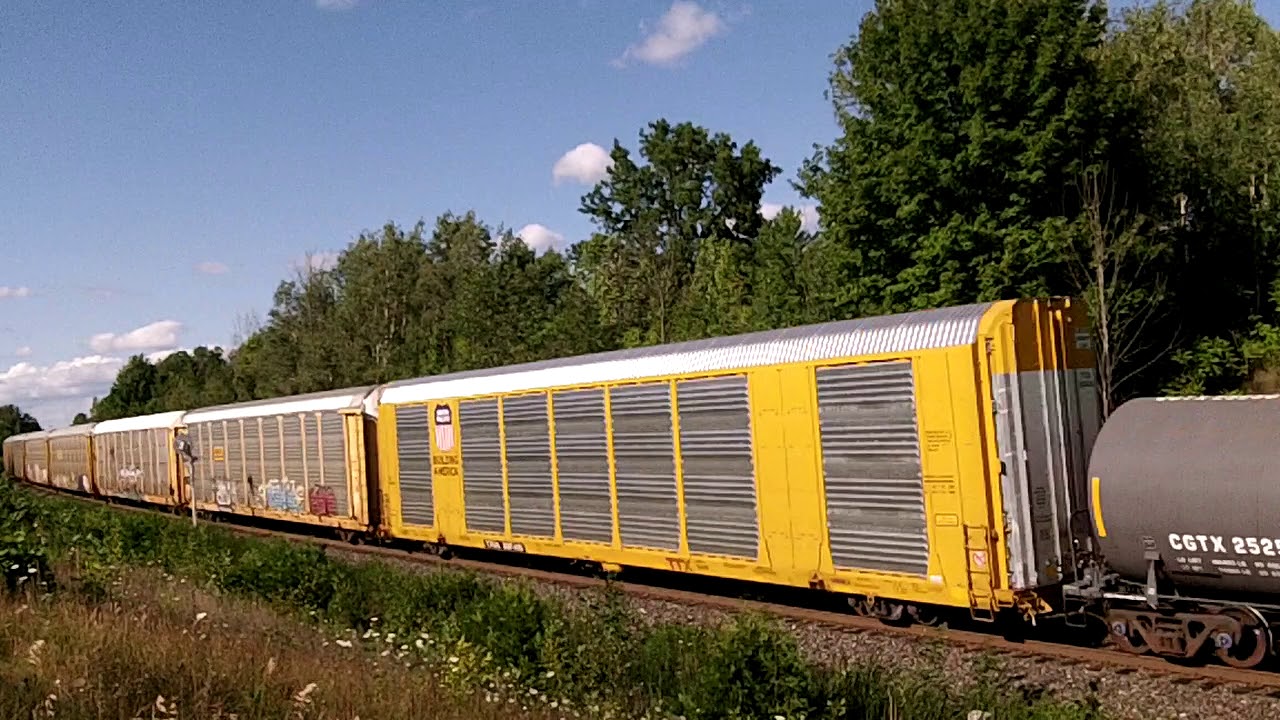 CN 399 w/ CN 3839 & CREX 1524 lead this long 680 axle, WB Mixed ...