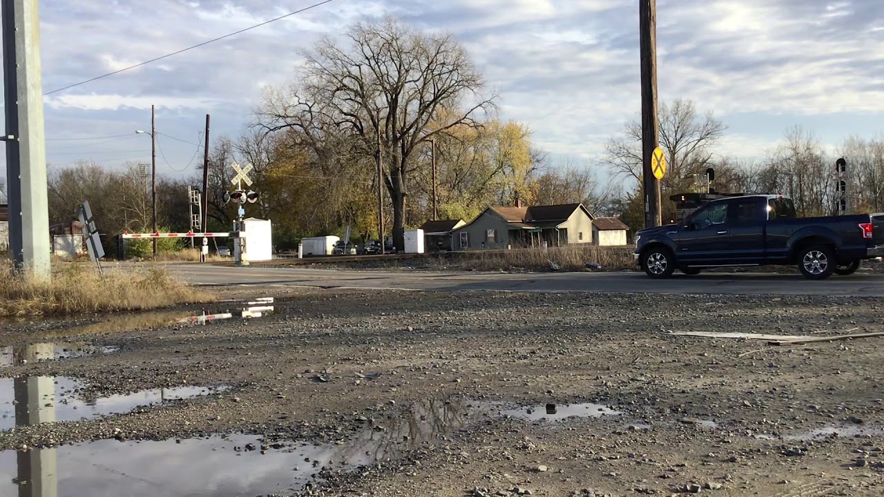 Empty well car train outside NS Watkins yard - YouTube