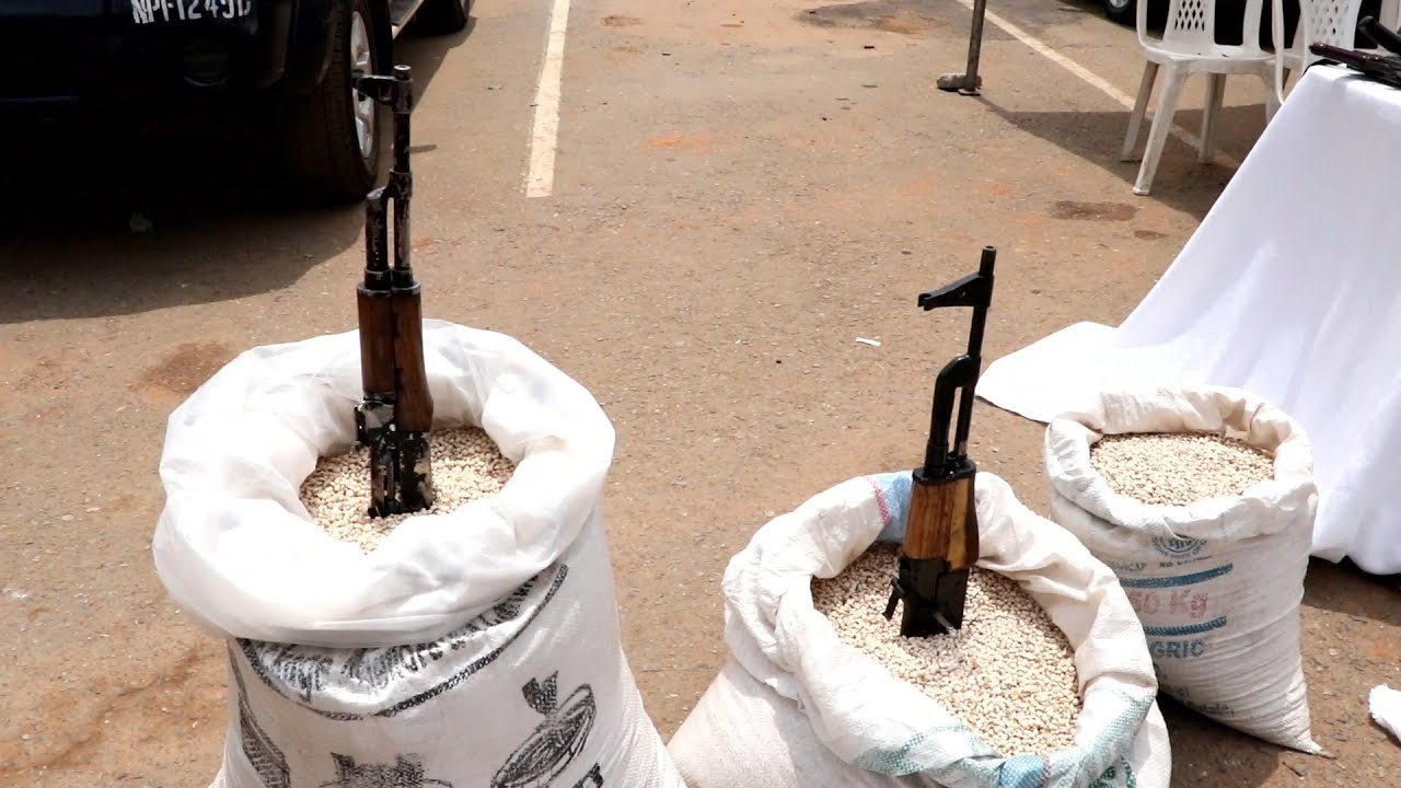 GUNRUNNERS CAUGHT TRANSPORTING AK 47 RIFLES CONCEALED INSIDE BEANS BAG ...