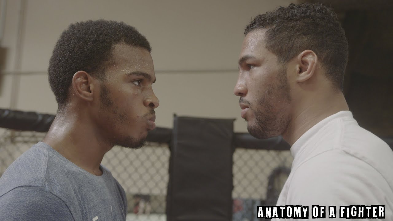 Kevin Lee coaches his brother Keith Lee in a sparring session with ...