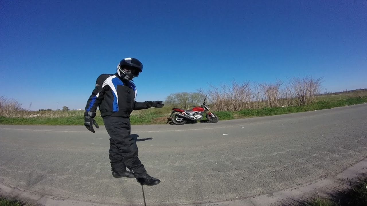 How to do a burnout (wheel spin) on a 125 motorbike - YouTube