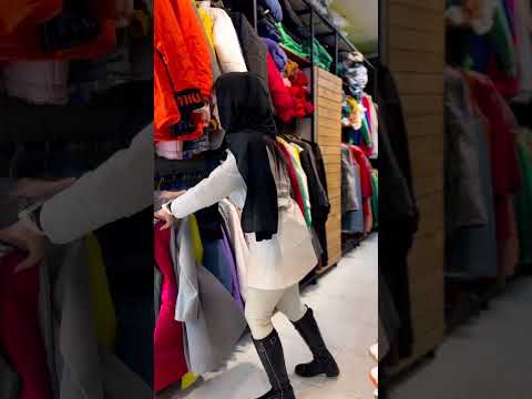 Woman in Hijab wear White Leggings, White Coat and Black Flat Boots
