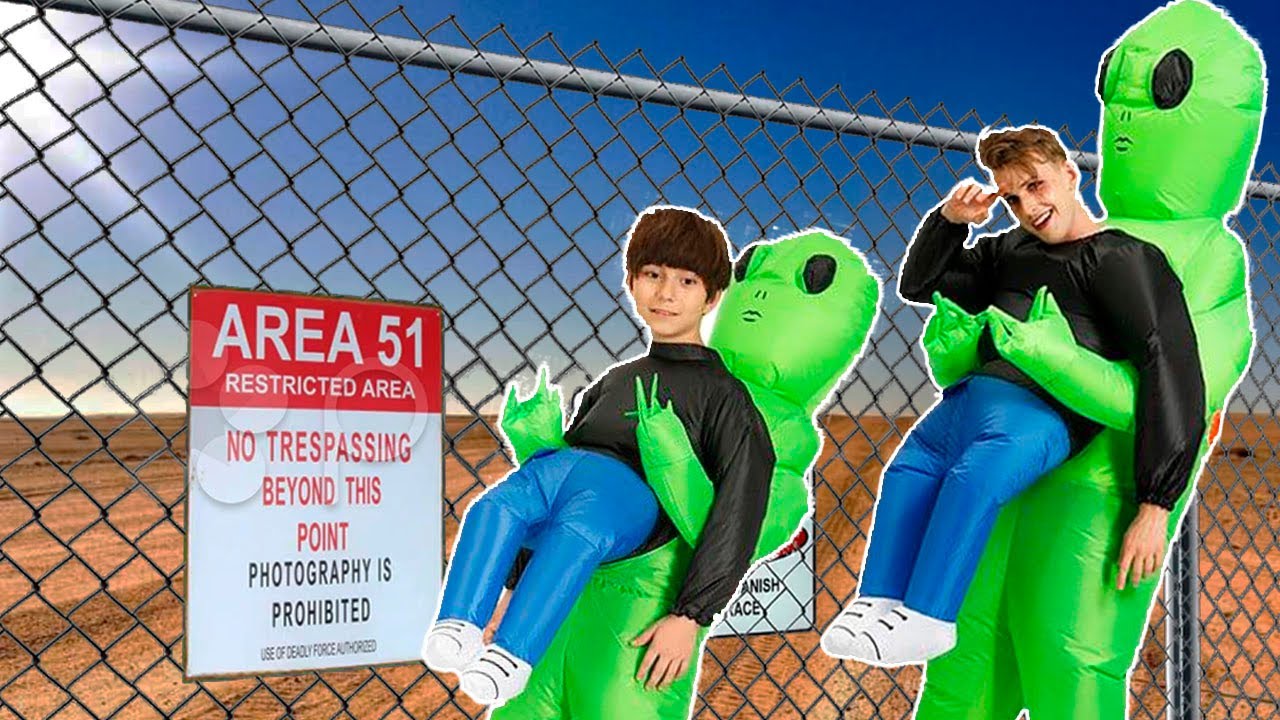 Alien Holding Man Costume Aliens have Escaped AREA 51 - YouTube