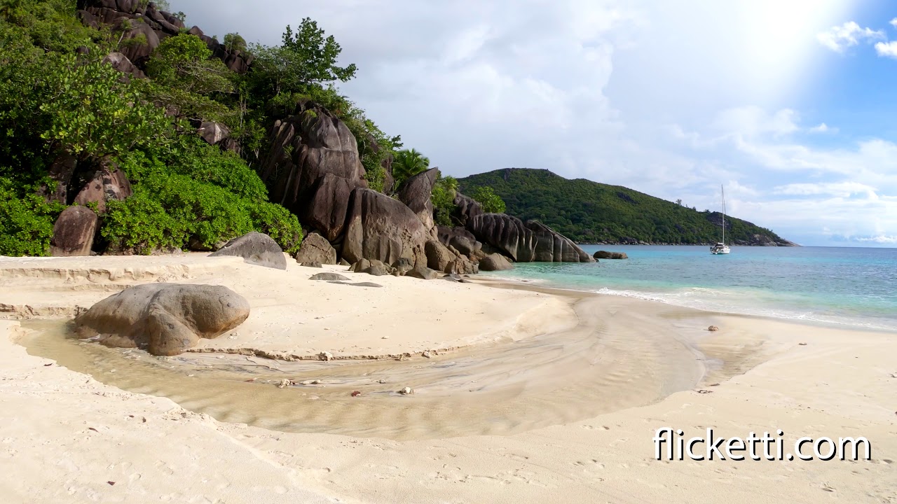 Beach with a river in Seychelles - YouTube