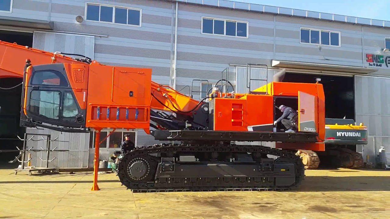 Hyd. tilt cabin for Doosan DX800LC with Material Handler Front - YouTube