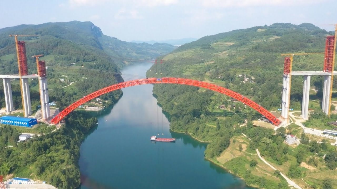 504-meter-wide arch for largest bridge of its type installed in Guizhou ...
