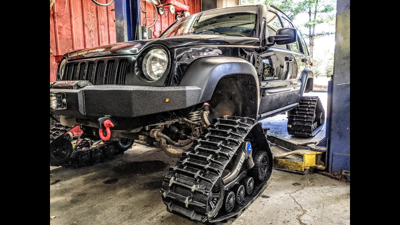 JEEP ON SNOW TRACKS CUSTOM BUILD - YouTube