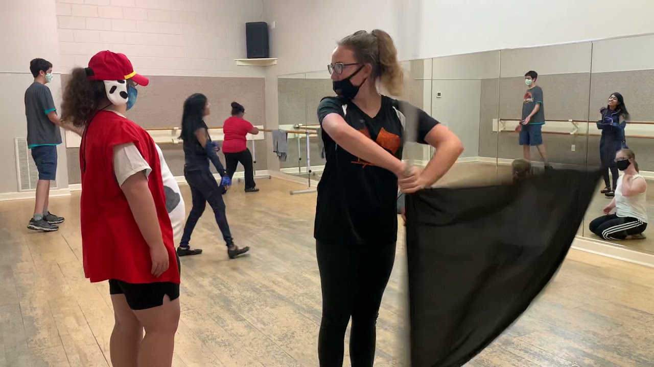Emily twirls flag at TDC - YouTube