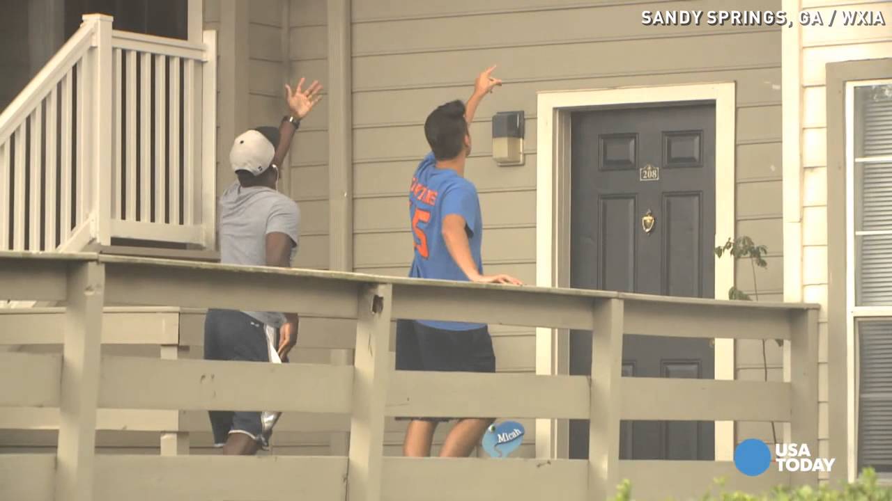 See girls dive out of window to escape massive fire - YouTube