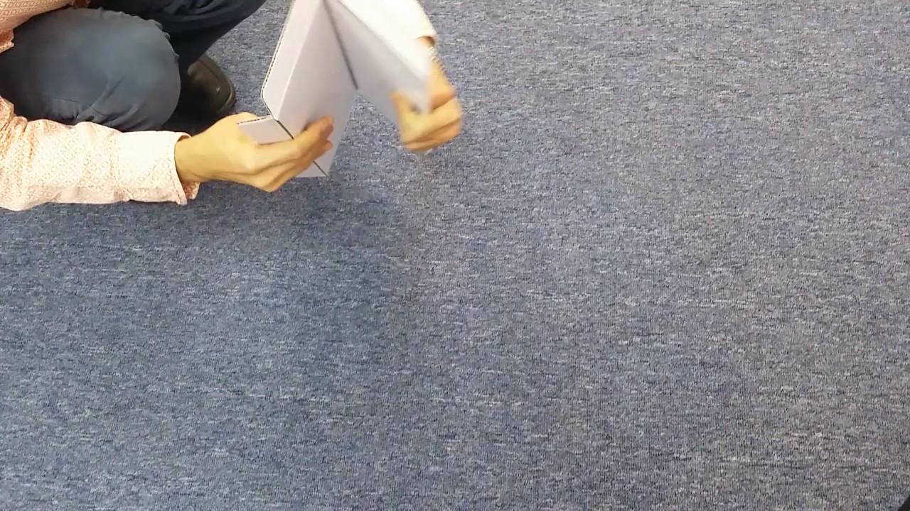 How the shelves are folded and inserted into the standee - YouTube