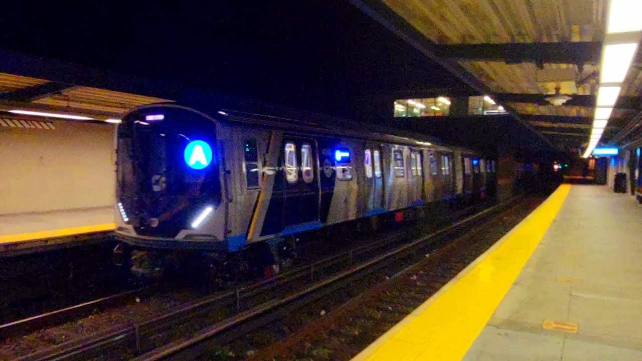 R211 A Train On the move! Passing Broad Channel under its own power ...