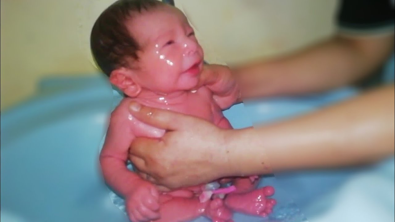 First shower of newborn baby after birth | newborn baby bath - YouTube