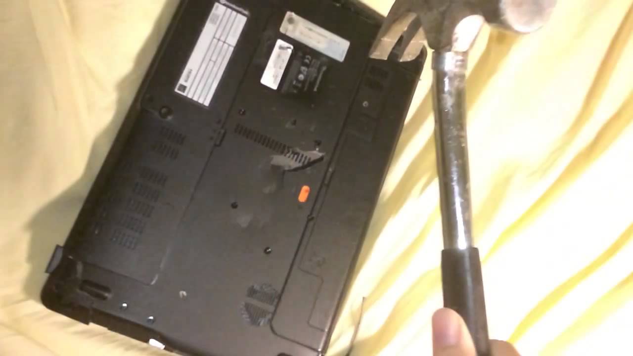 Smashing crappy laptop in bed slow motion - YouTube
