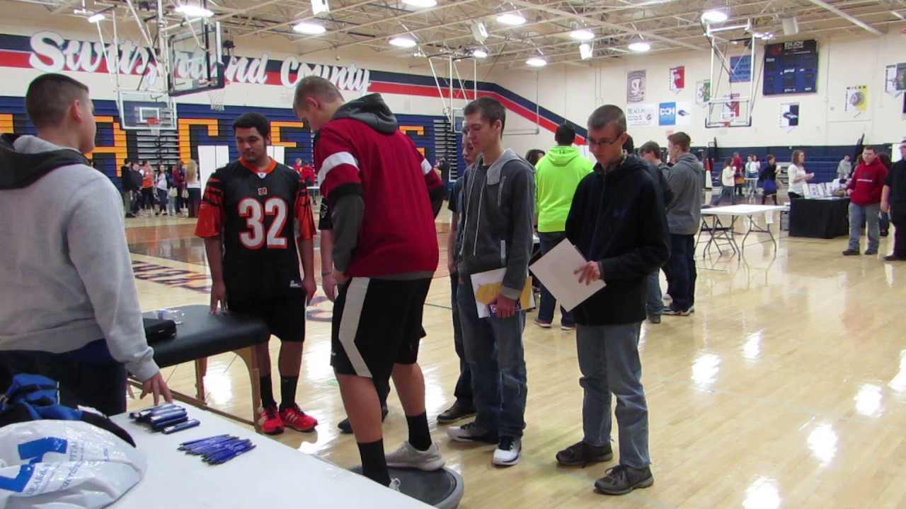 Kaleb Harrell checks his balance during career day - YouTube