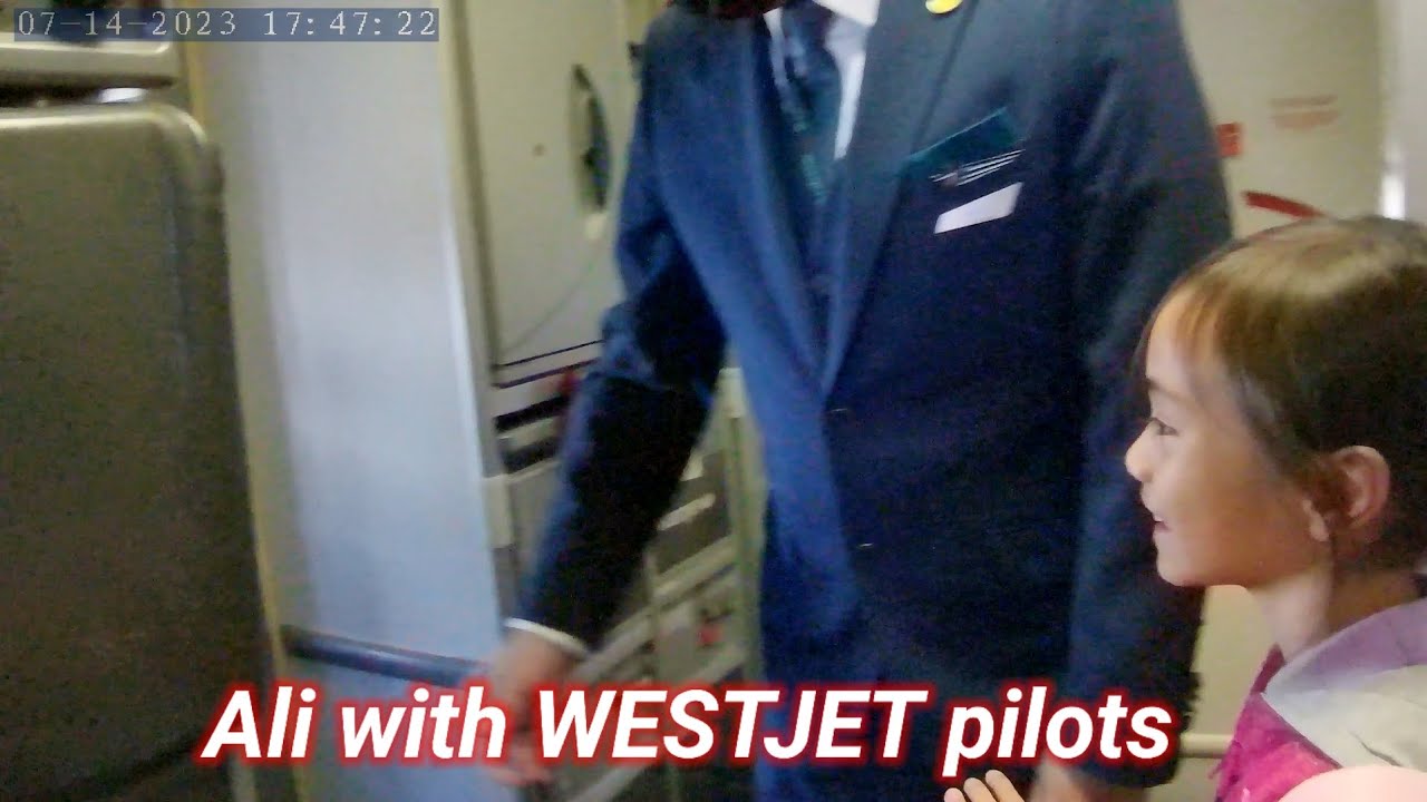 Ali's first flight ever. Chats with Westjet pilots in the cockpit. - YouTube