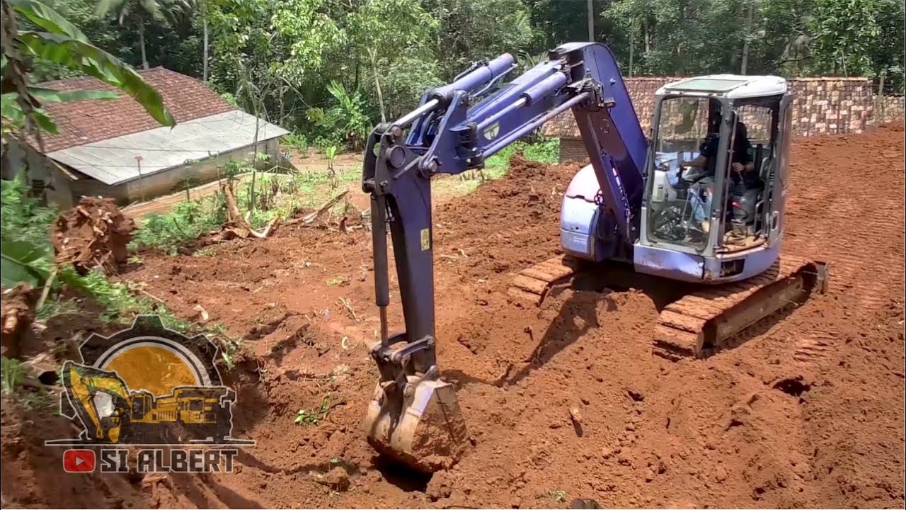 The land excavation process for construction uses the KOMATSU PC78UU Mini Excavator - YouTube