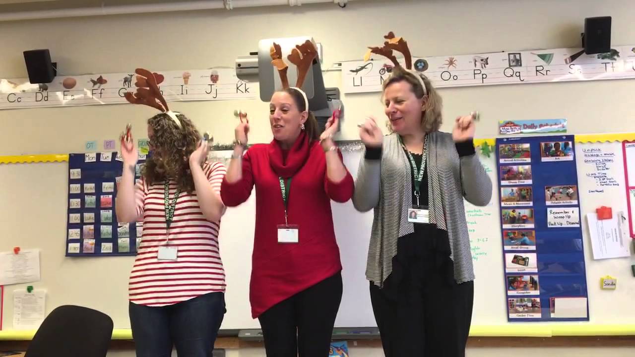 Luke's teachers sing Jingle Bells - YouTube