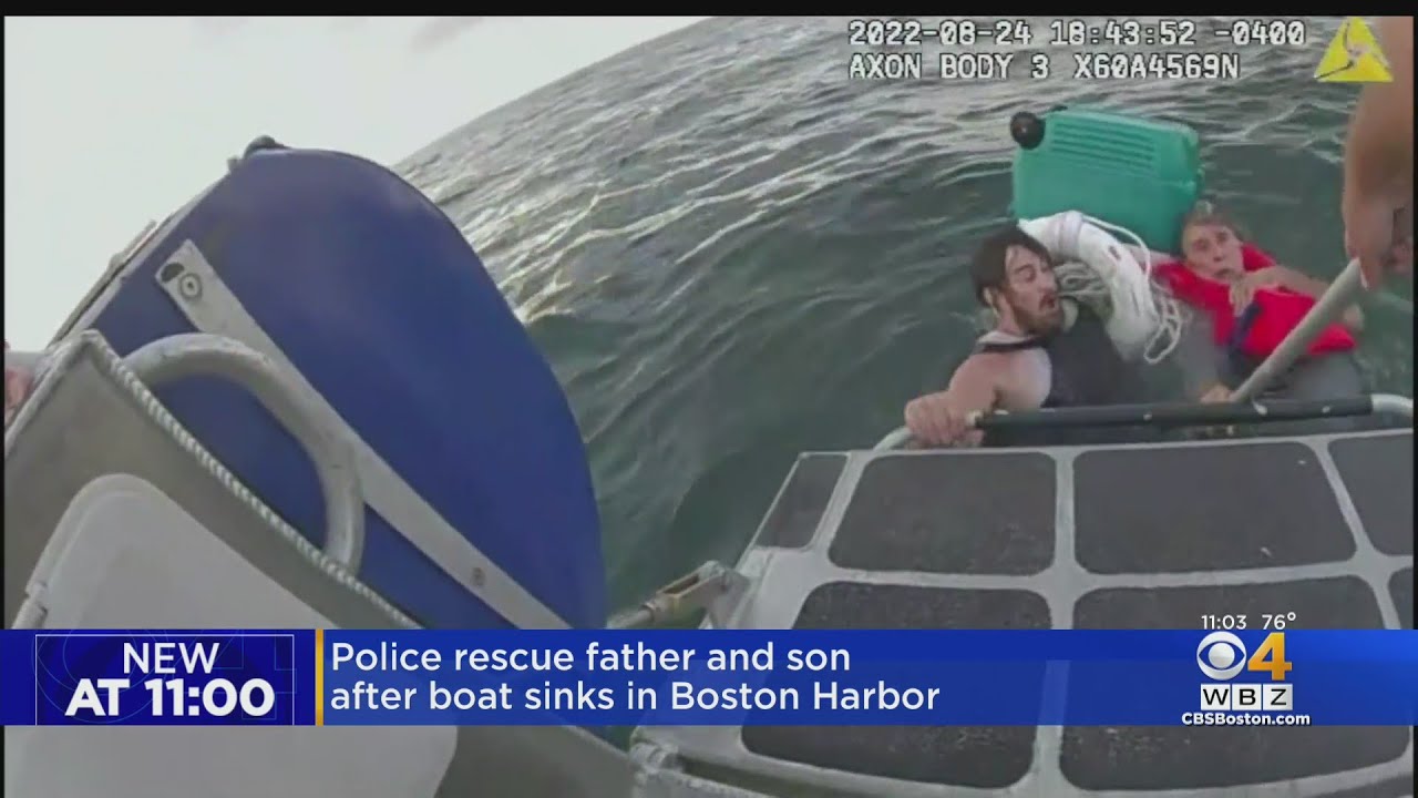 Police rescue father and son from Boston Harbor after boat sank - YouTube
