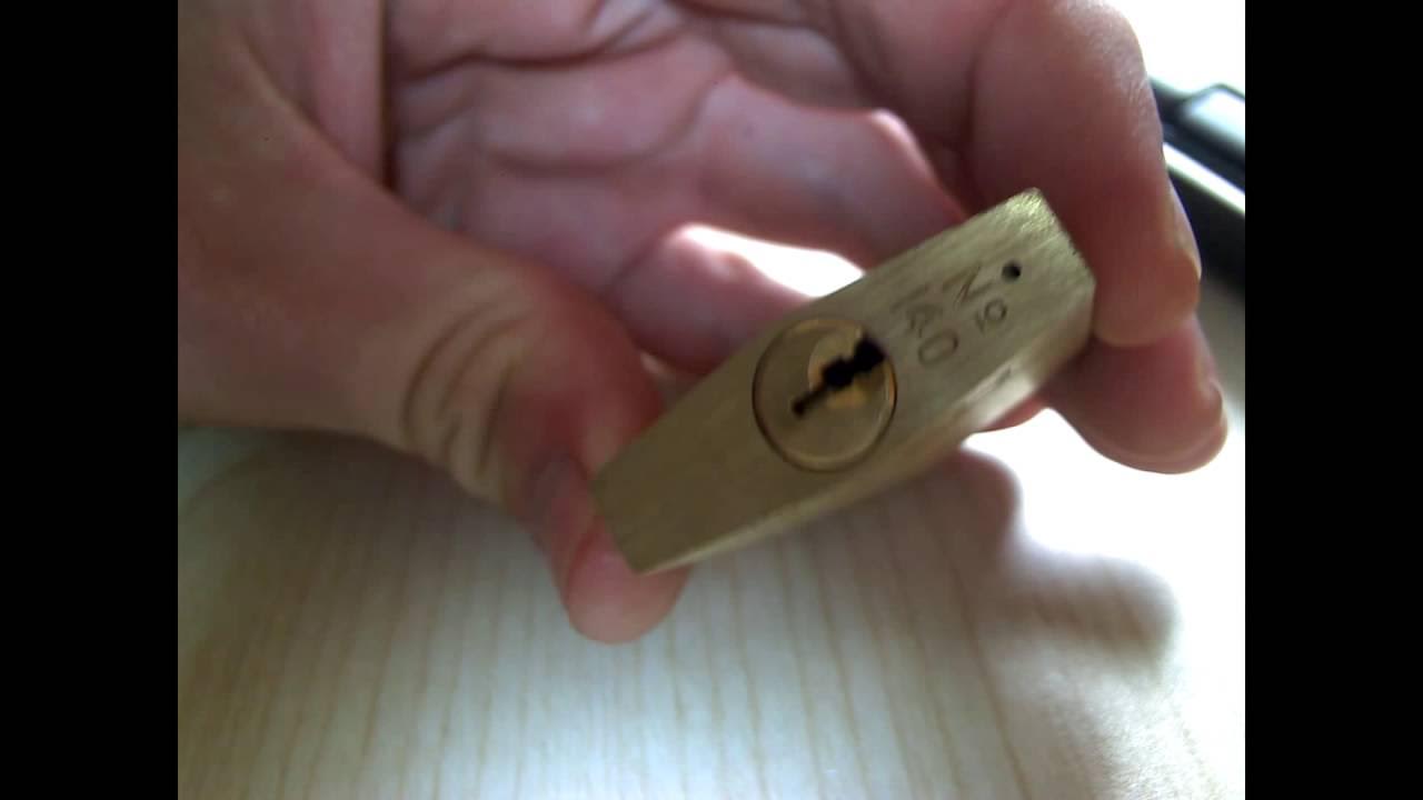 unlock a master lock without key - YouTube
