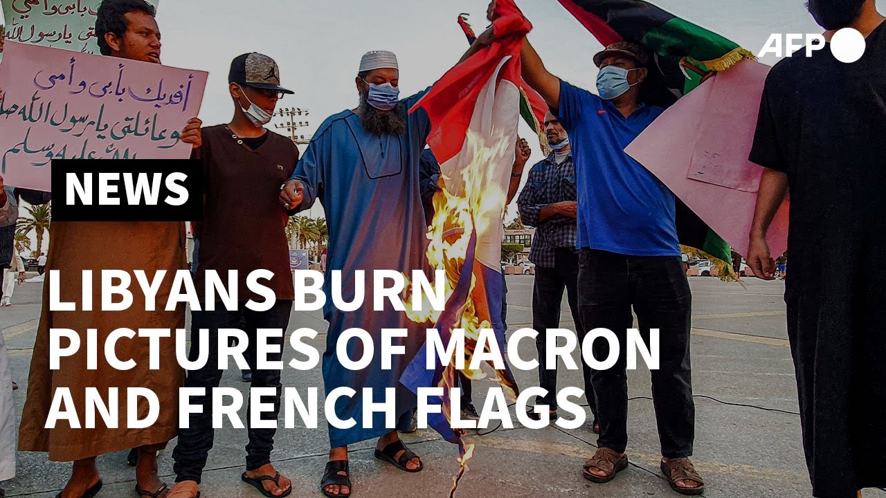 Libyans burn French flags, Macron pictures | AFP - YouTube