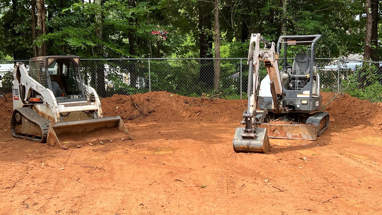Beautiful retaining wall build, it took some skid steer work and we had ...