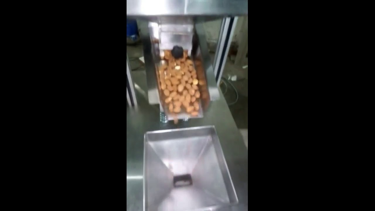 Automatic Badam & Pista Cutting Machine - YouTube