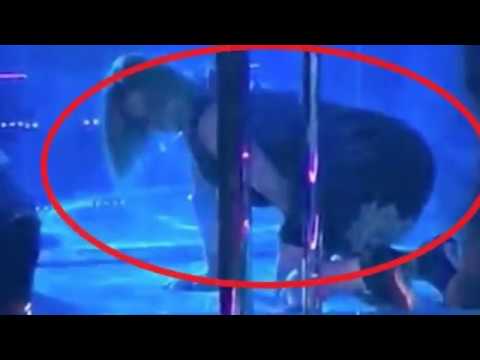 Jennifer Lawrence whips off her top and turns pole dancer