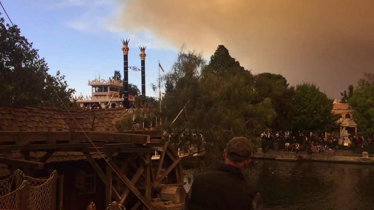 Disneyland with nearby fire in the hills. - YouTube