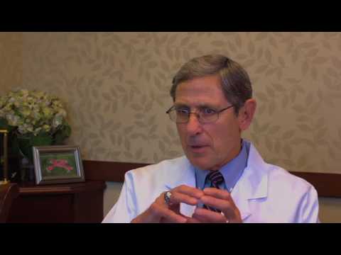 How does estrogen play a role in a woman's breast changes throughout life?