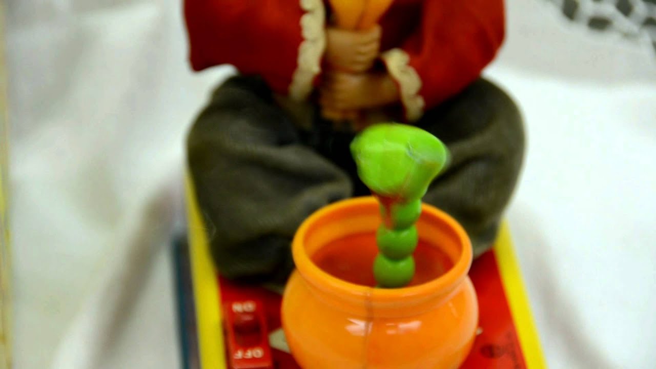 Vintage Toy Snake Charmer and Snake - YouTube