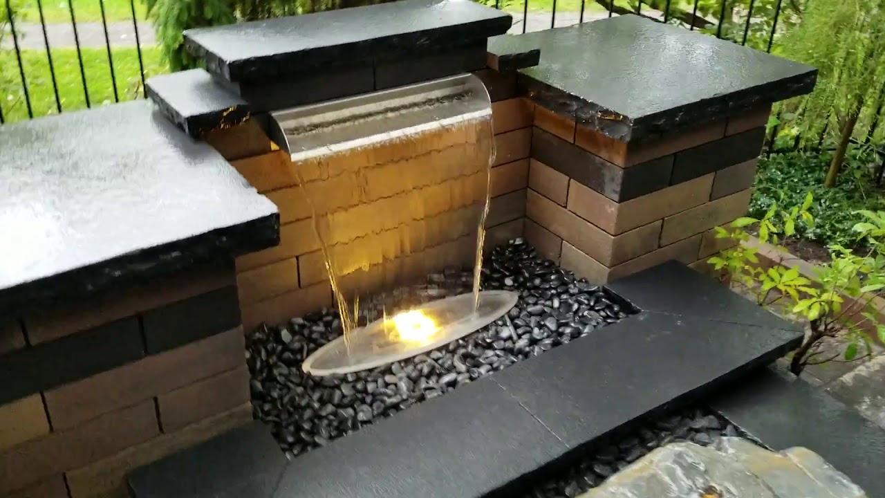 Formal Scupper Waterfall Construction With Limited Access - YouTube