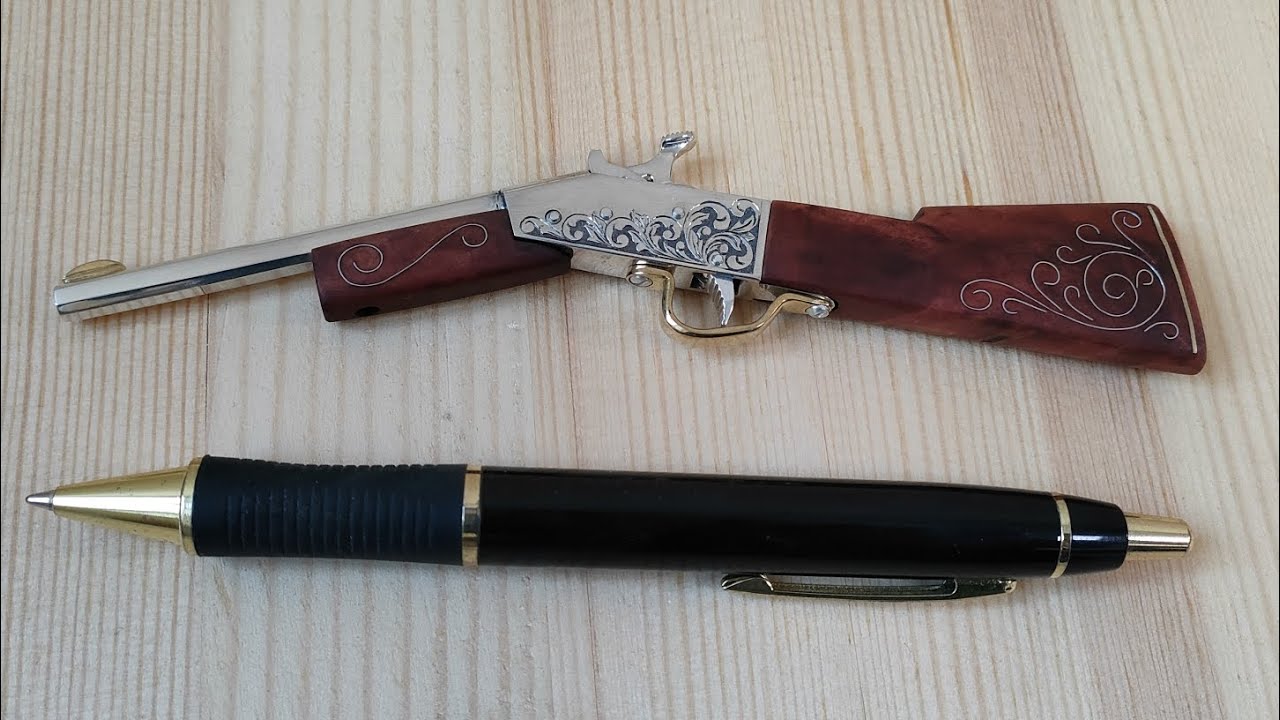 Sterling silver rifle. - YouTube