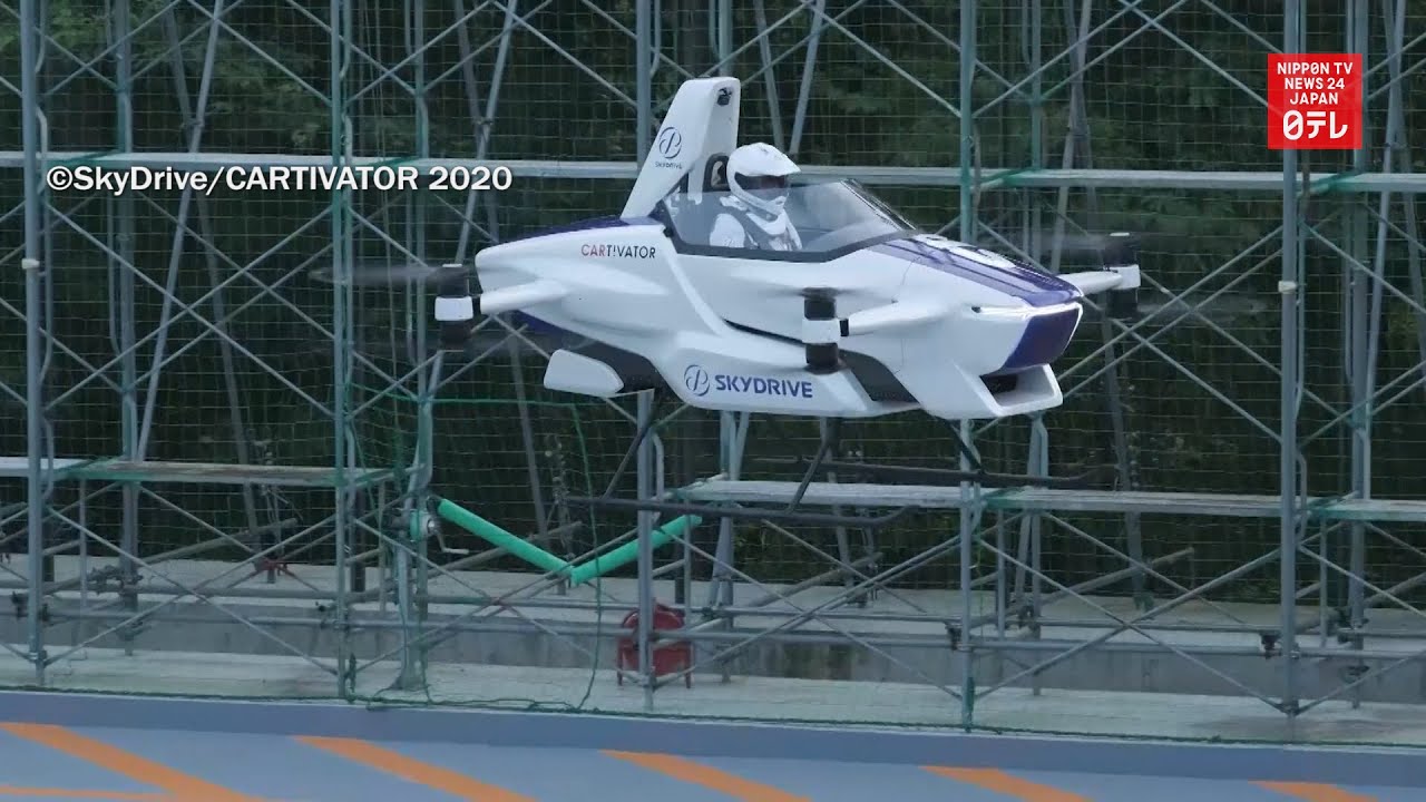 Manned flying car goes on test flight - YouTube