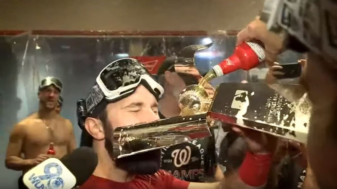 Washington Nationals celebrate win with locker room CHAMPAGNE SHOWER ...