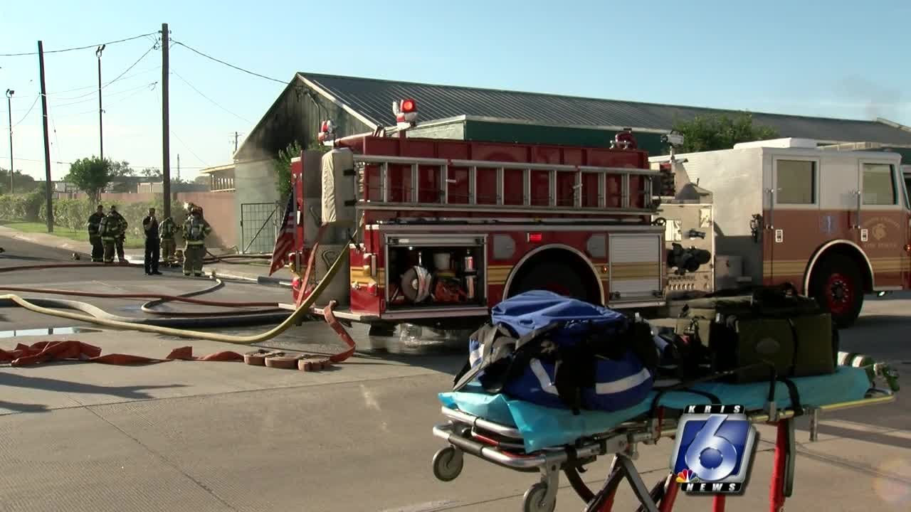 Investigators look for cause of commercial business fire - YouTube