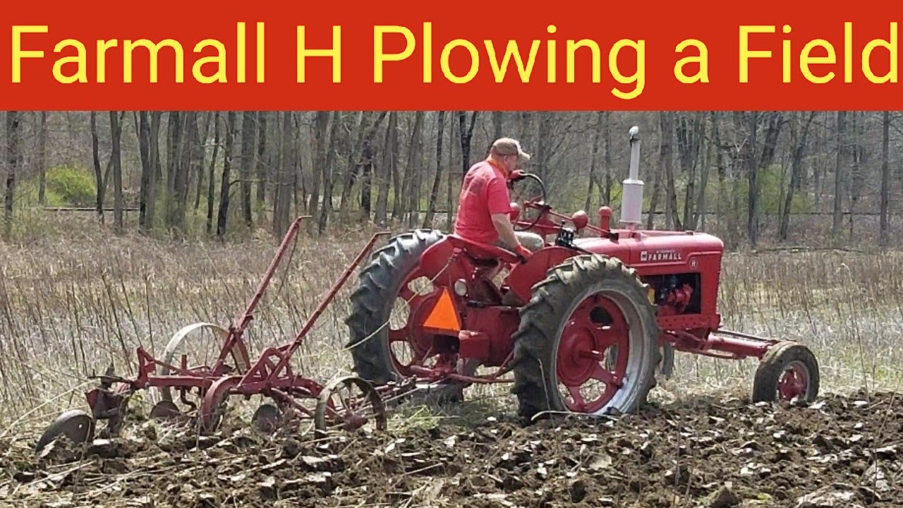 Farmall H Plowing a Field - YouTube