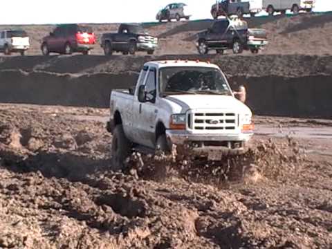 Lifted Ford F-250 mudding w/michelin tires - YouTube