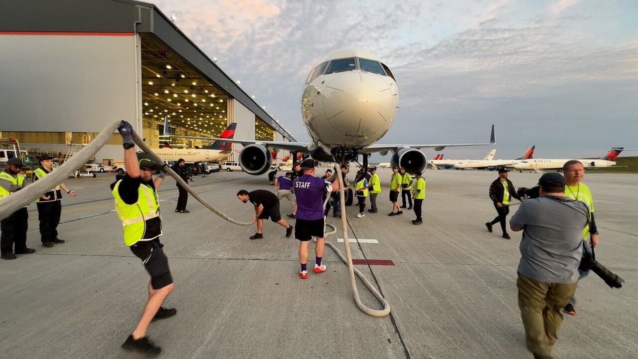Delta jet drag expected to raise $1.3M for cancer research - YouTube