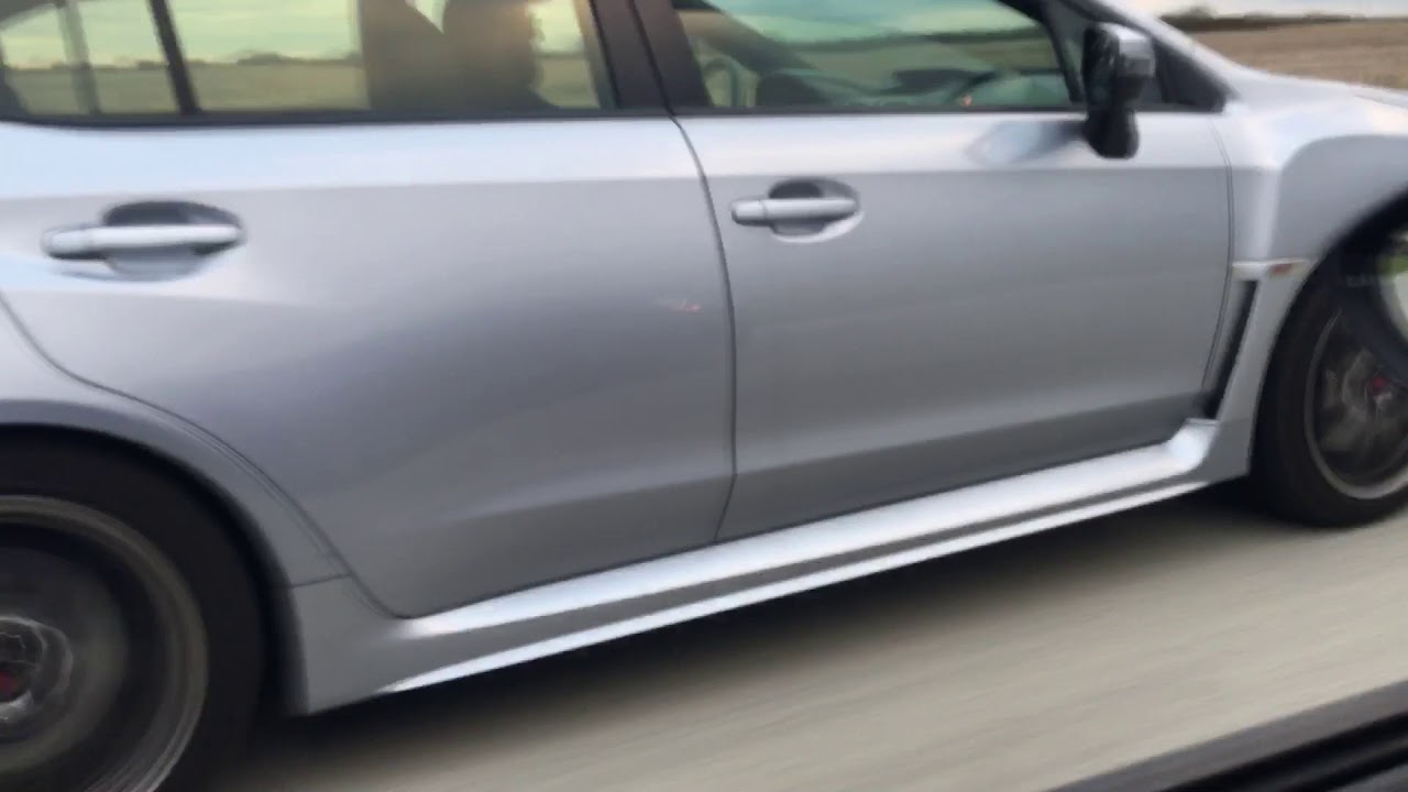 Stock wrx sti vs stock golf r - YouTube
