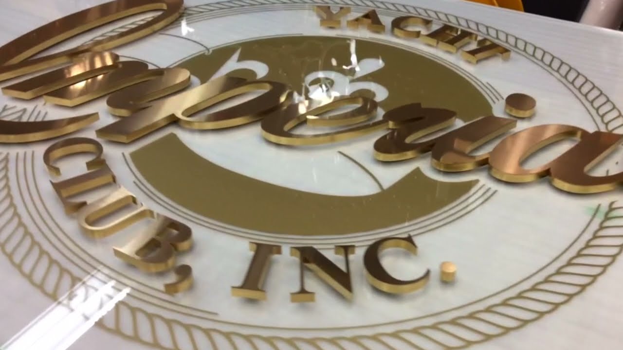 Brushed gold Wall office Signage ½" brushed gold logo mounted to the ...
