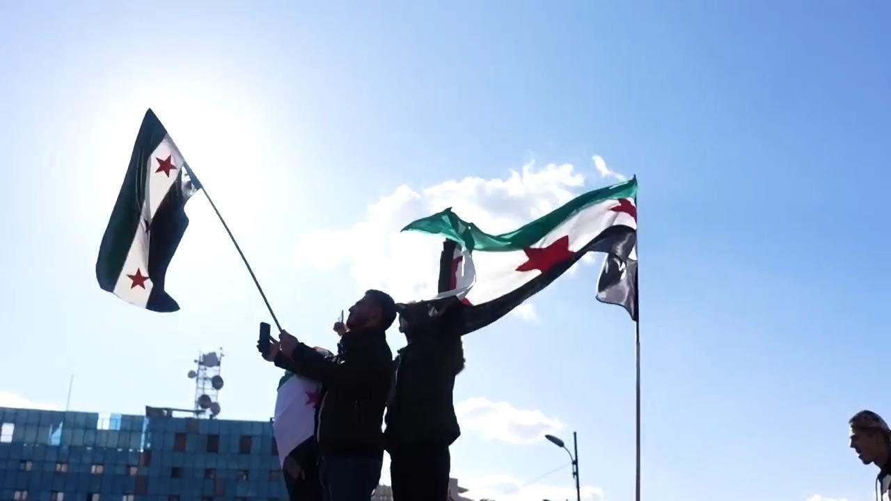 Thousands of Syrians celebrate in central Damascus during first Friday ...