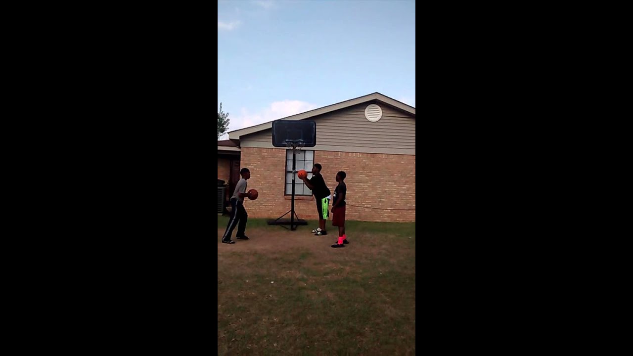 Boy gets hit in face with a basketball - YouTube