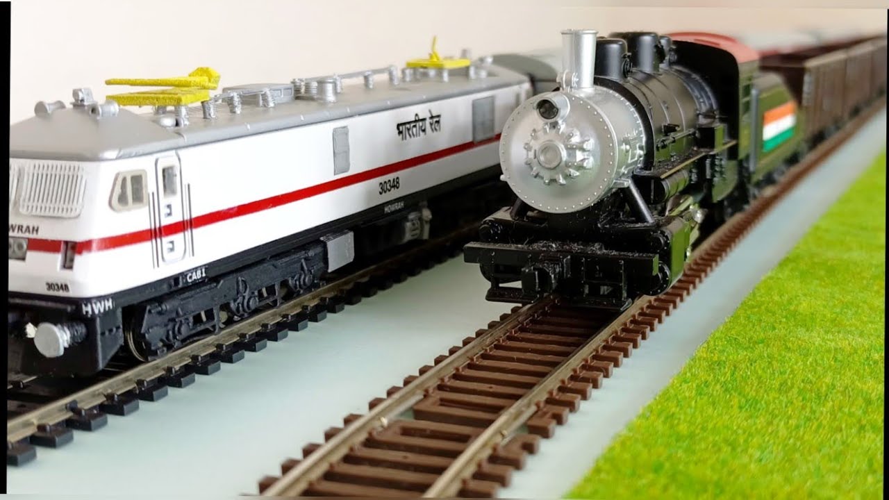When HO Scale Steam Train Zooms Past Stationary Rajdhani Express - YouTube