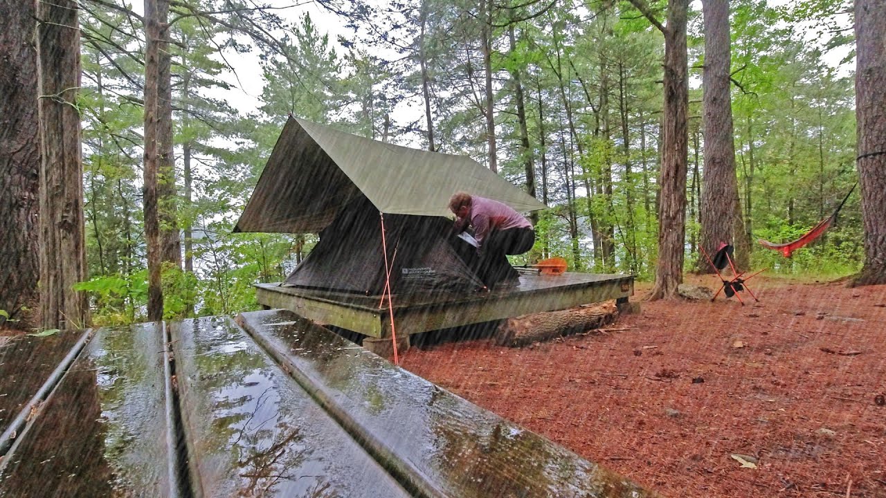 HEAVY RAIN (solo canoe camping in the rain) - YouTube