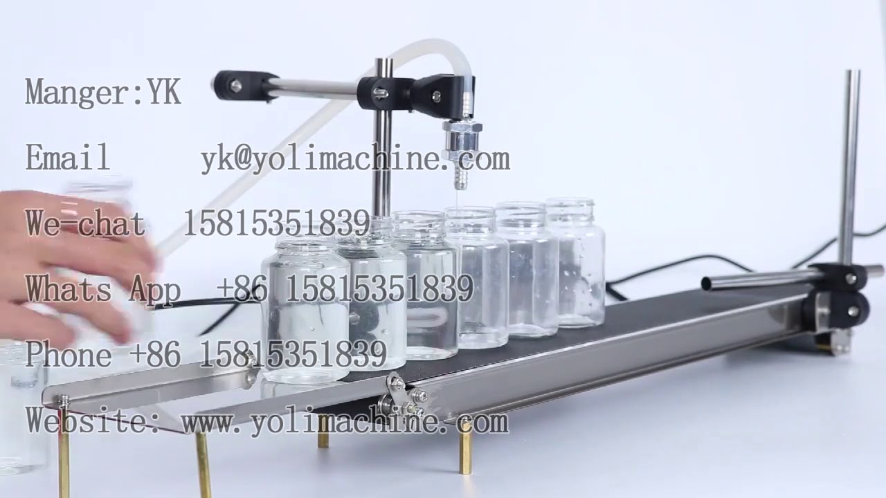 Single Head Liquid Filler - YouTube