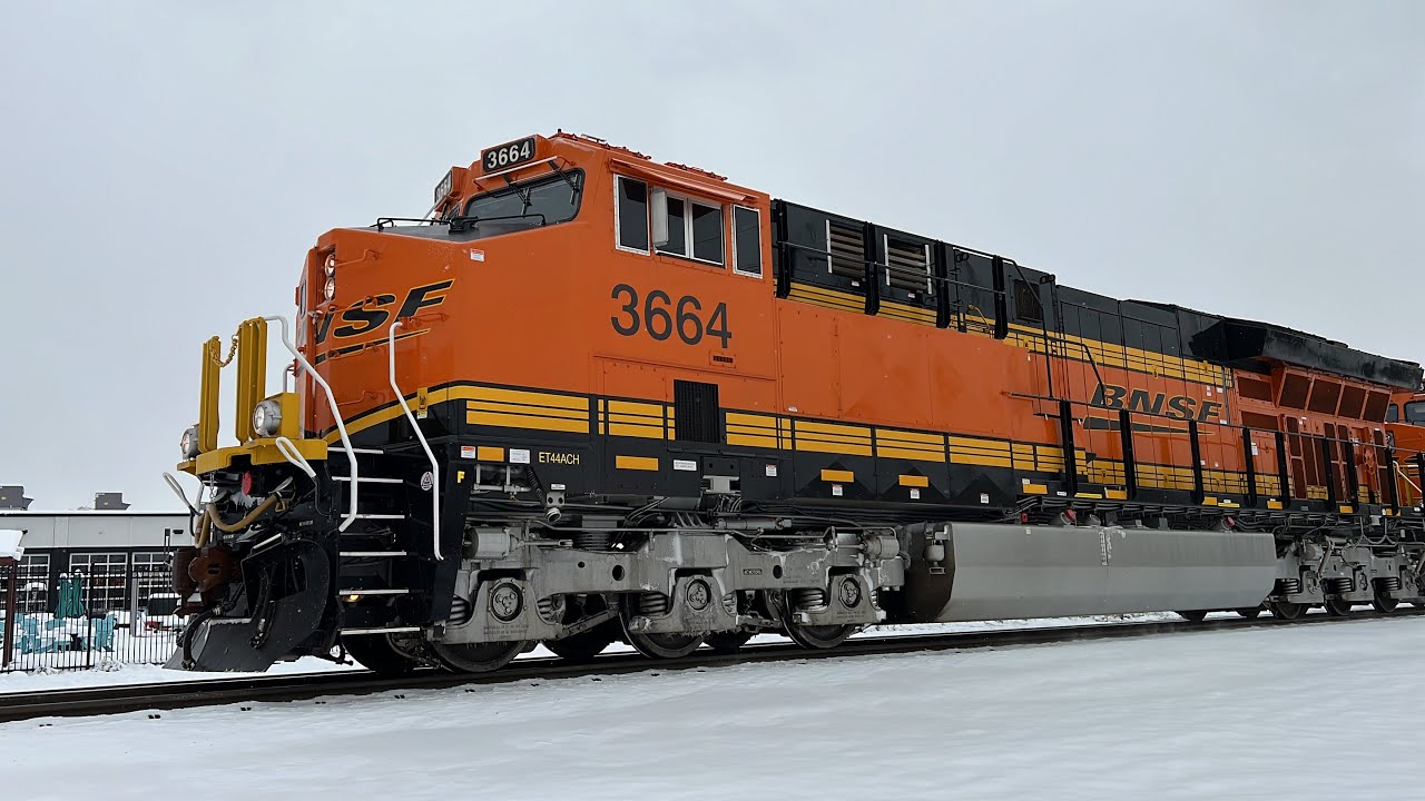 Brand New BNSF ET44ACH Units Lead Through the Snow - YouTube