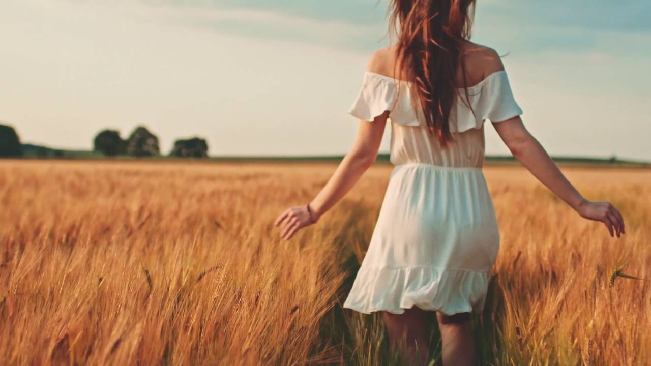 beautiful girl running on sunlit wheat field slow motion 120 fps - YouTube